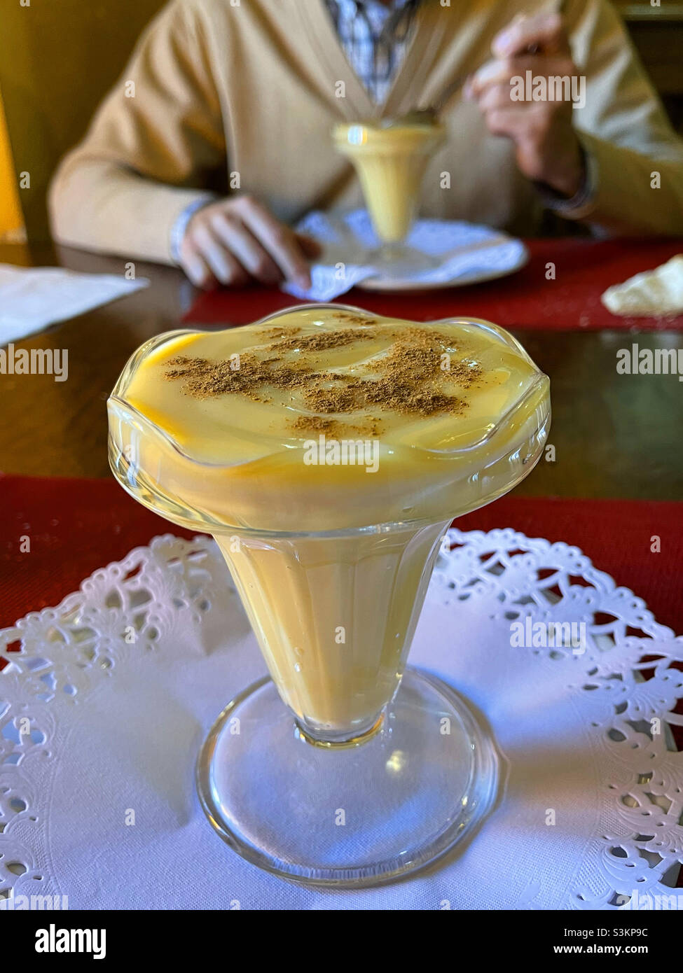 Eating creamy dessert Stock Photo - Alamy