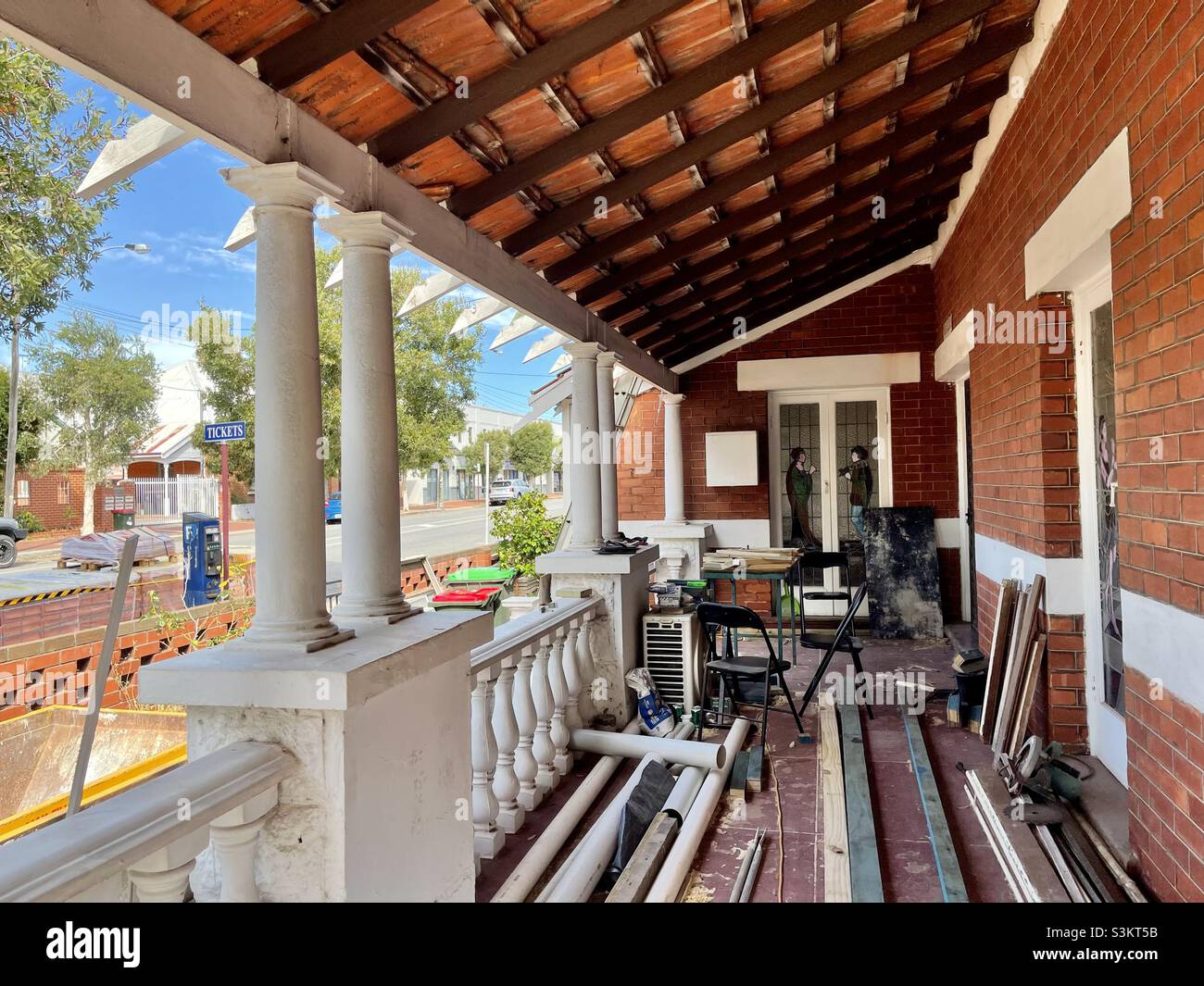 Building materials on verandah of Federation house undergoing ...