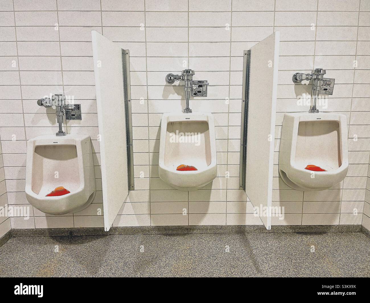 Trio of urinals Stock Photo - Alamy