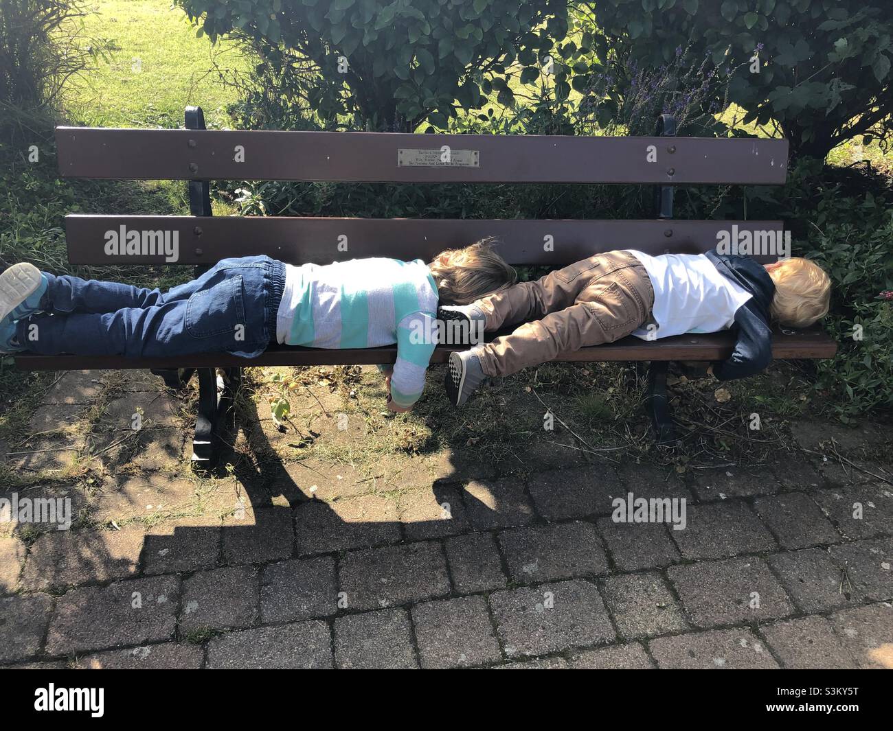 Boys on the bench hi-res stock photography and images - Alamy