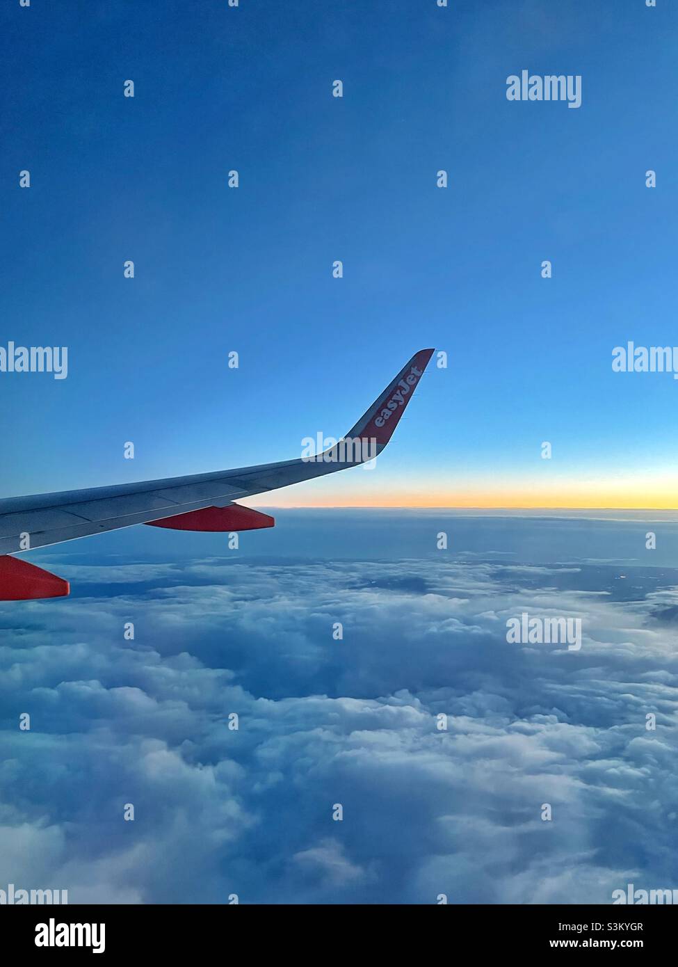 EasyJet plane en route to Edinburgh from Bristol, with sunrise over ...