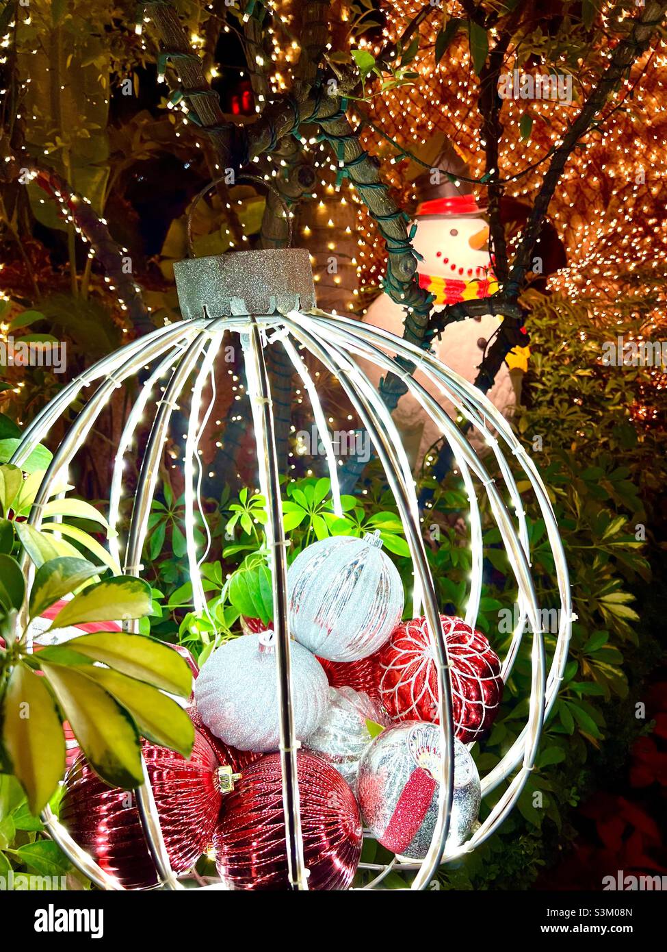 Holiday decorations lit up Stock Photo - Alamy