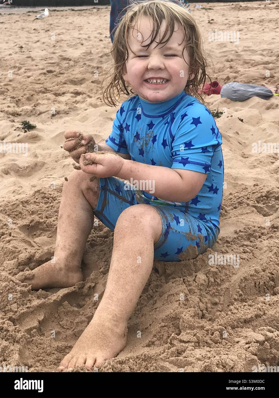 Fun on the beach Stock Photo - Alamy