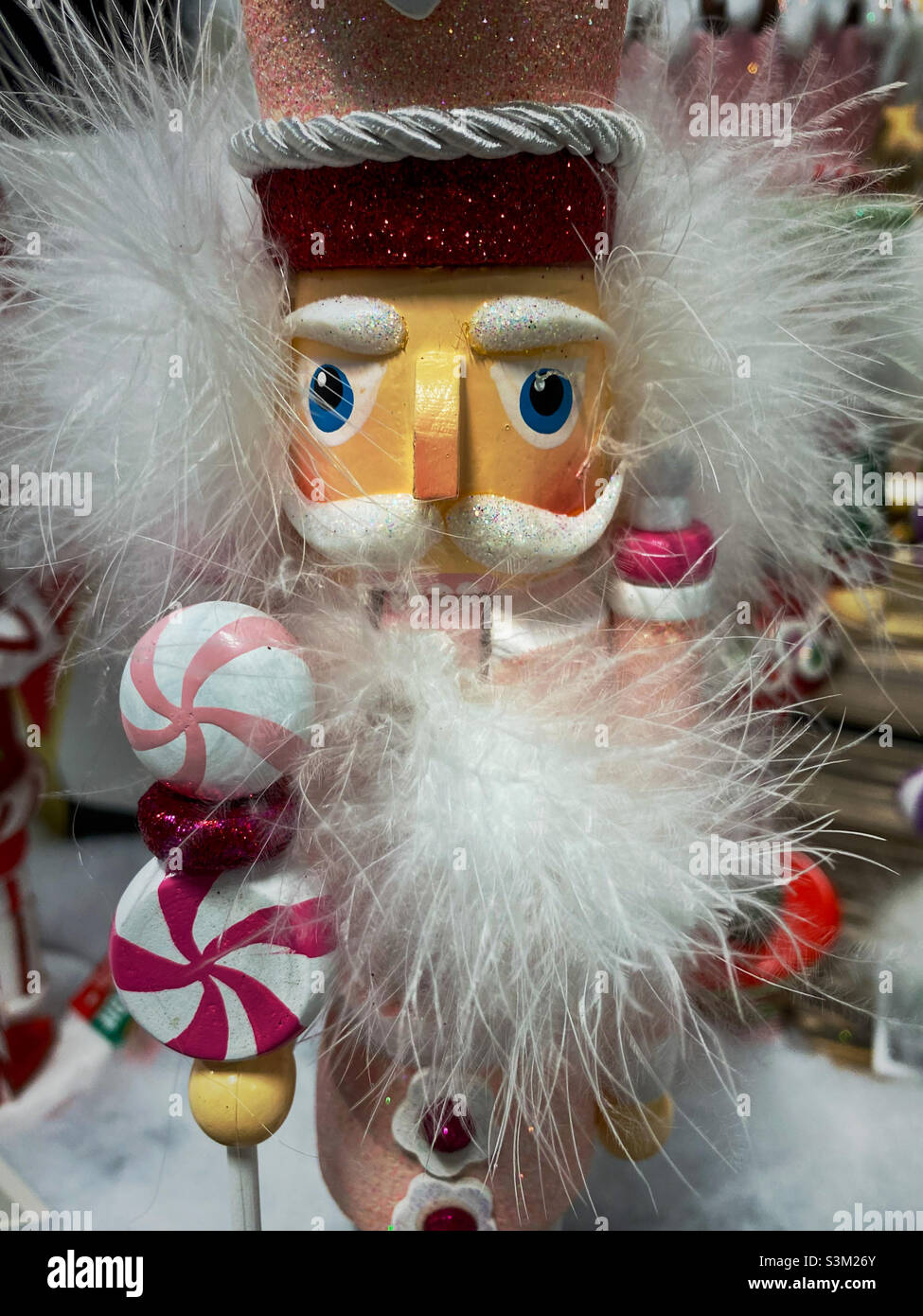 Holiday nutcracker with a big white beard Stock Photo - Alamy