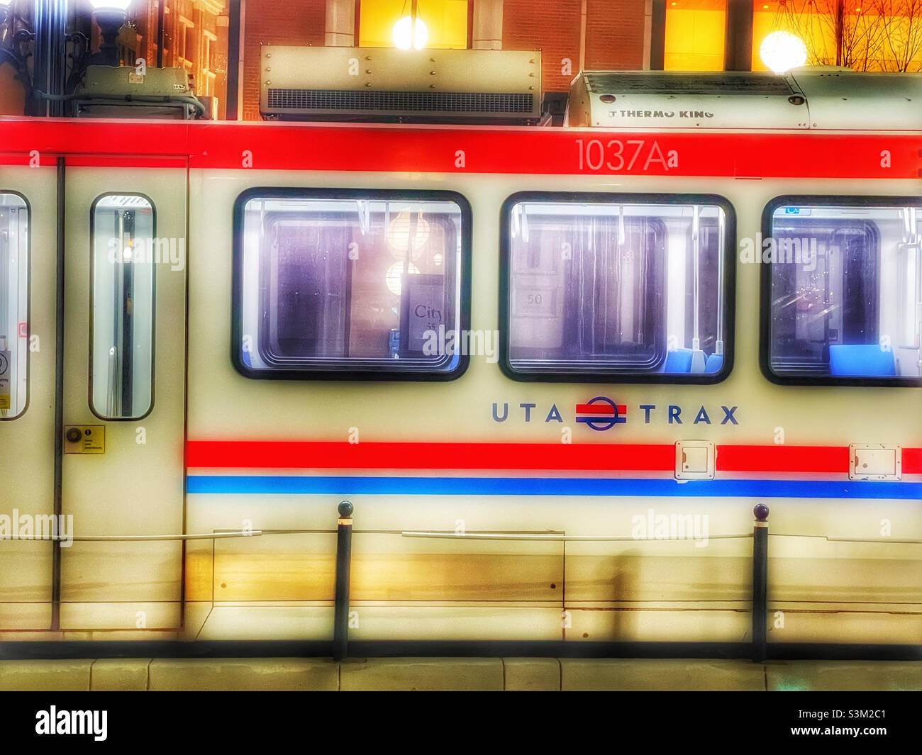 UTA (Utah Transit Authority) Trax train stops along Main Street in ...