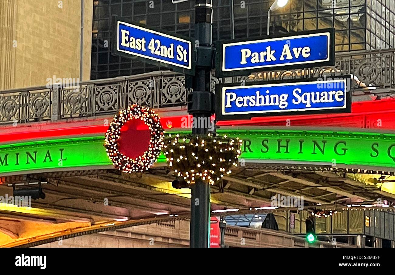 Illuminated sign posts at Pershing Square during the festive holiday ...