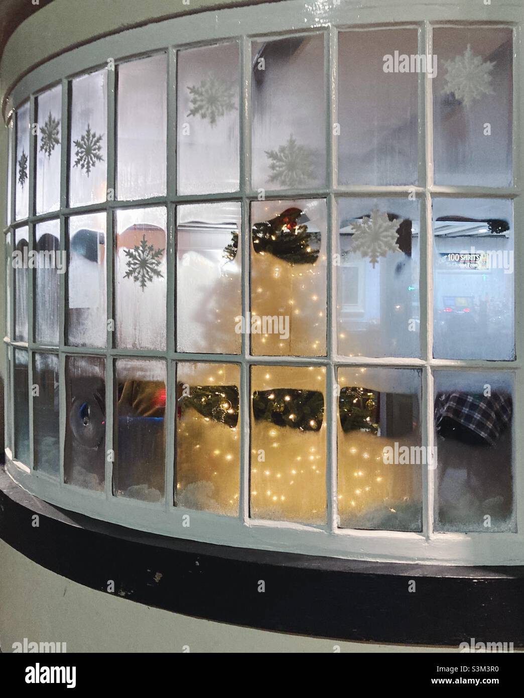 A Christmas tree viewed through a steamy window Stock Photo - Alamy