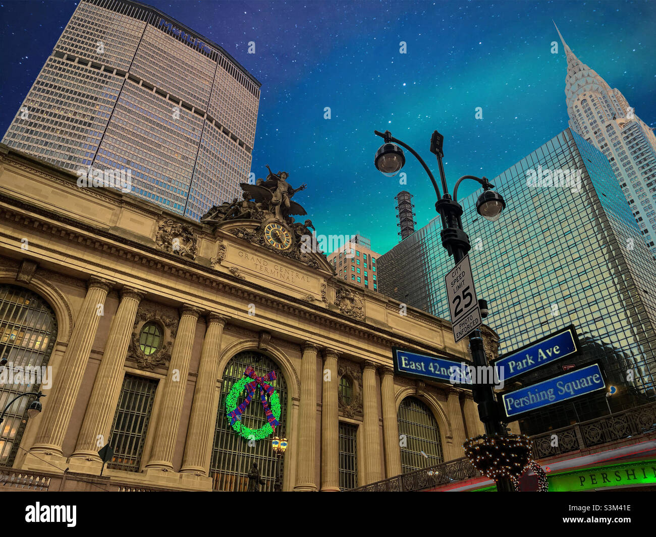 During the evening hours the giant wreath at the Pershing Square ...
