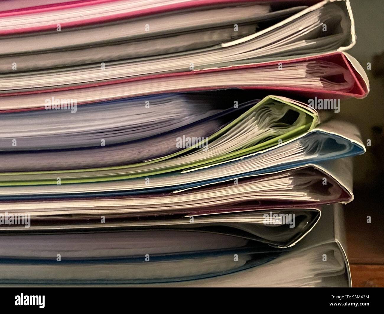 A collection of plastic display books seen from the edge Stock Photo ...