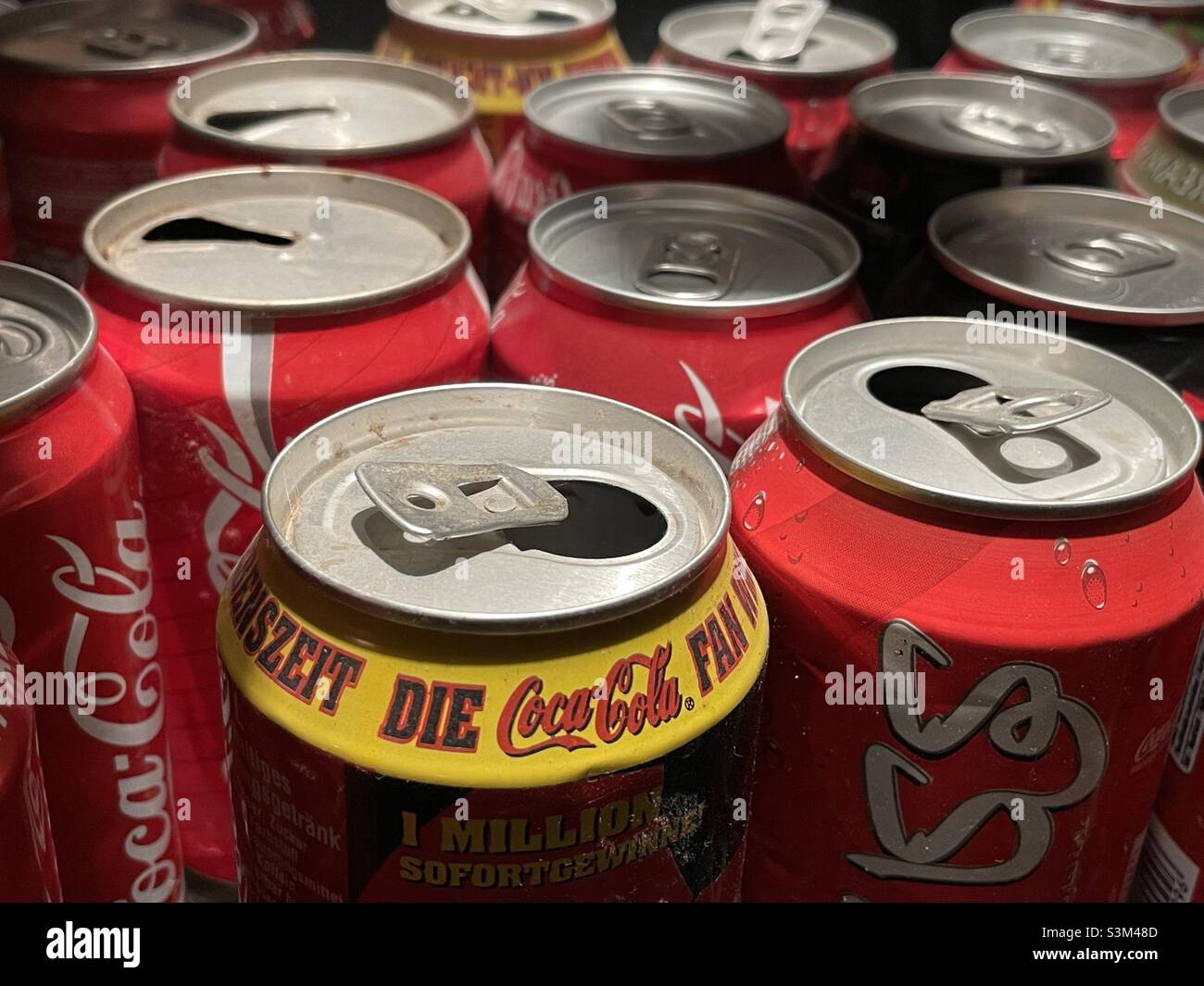 A collection of empty drinks cans from different parts of the world Stock Photo - Alamy