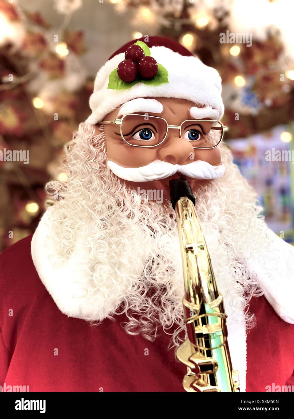 Trumpet Playing Santa Stock Photo - Alamy