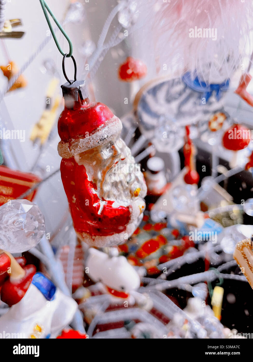 Vintage German glass Santa Claus ornament hanging on a metal and glass ...