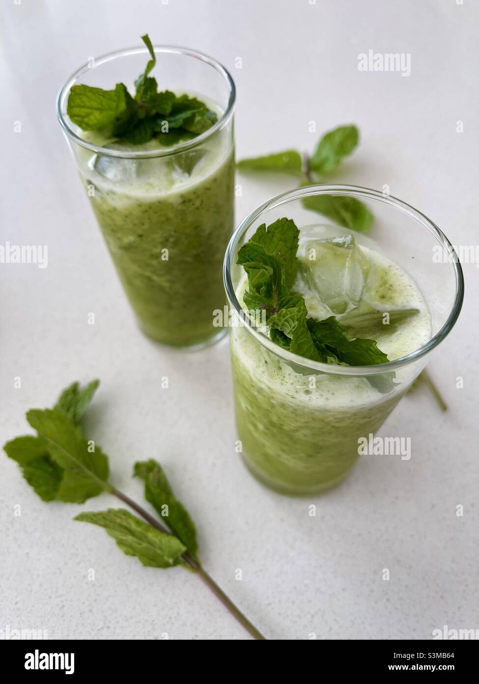Pineapple and mint juice,mint juice, white background Stock Photo - Alamy