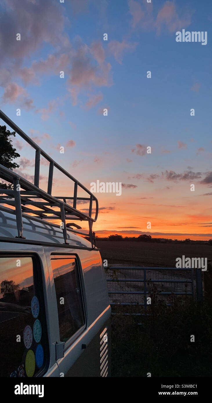 Sunset Vintage VW Camper Van Splitty Stock Photo - Alamy