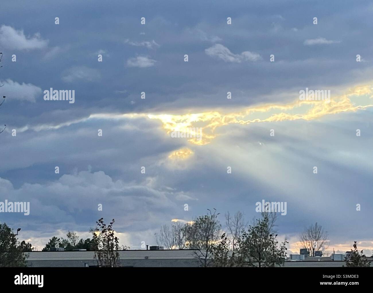 Sun burst through clouds hi-res stock photography and images - Alamy