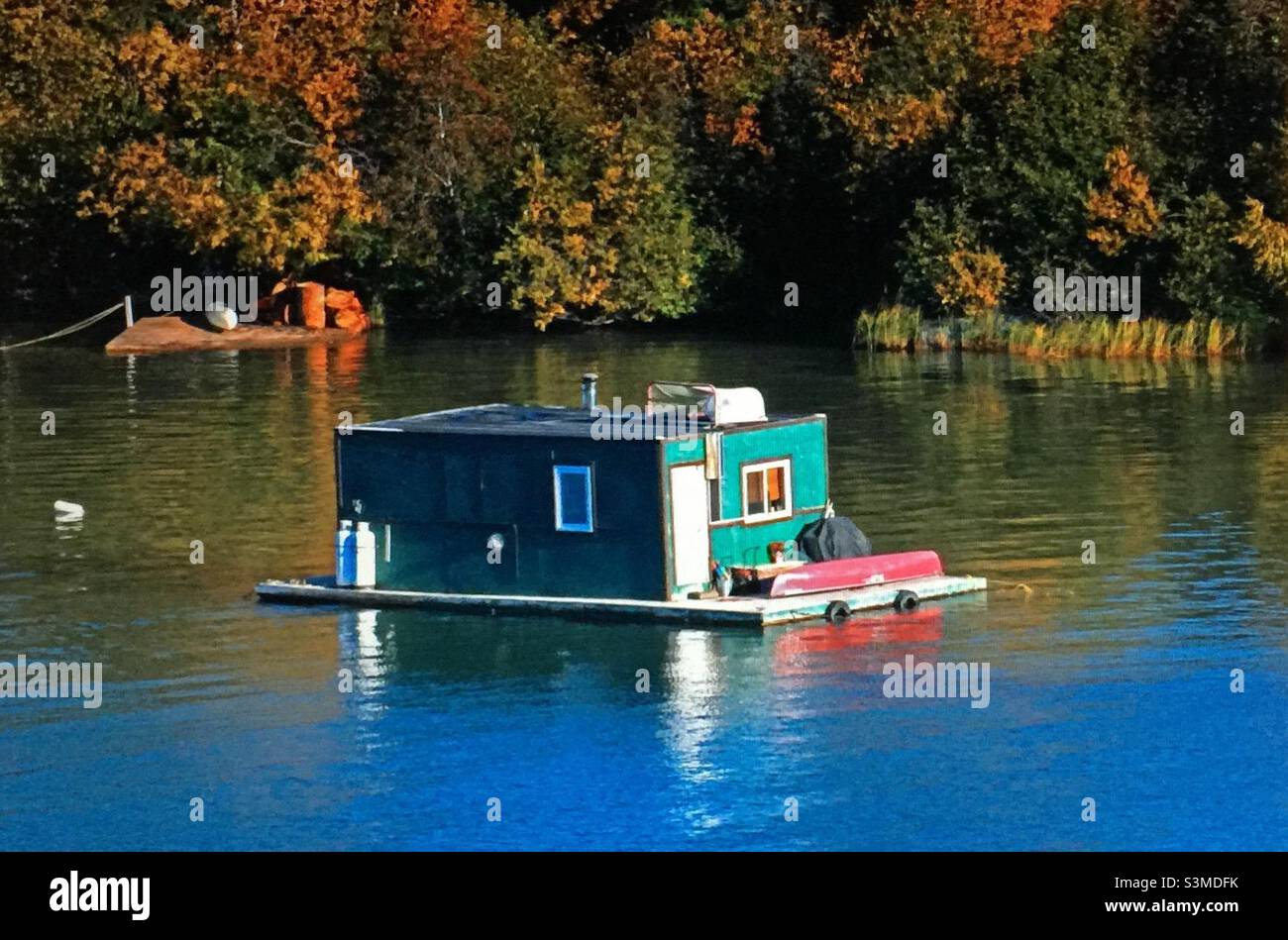 Floating summer cabin, autumn colours, fall, forest, lakeside ...