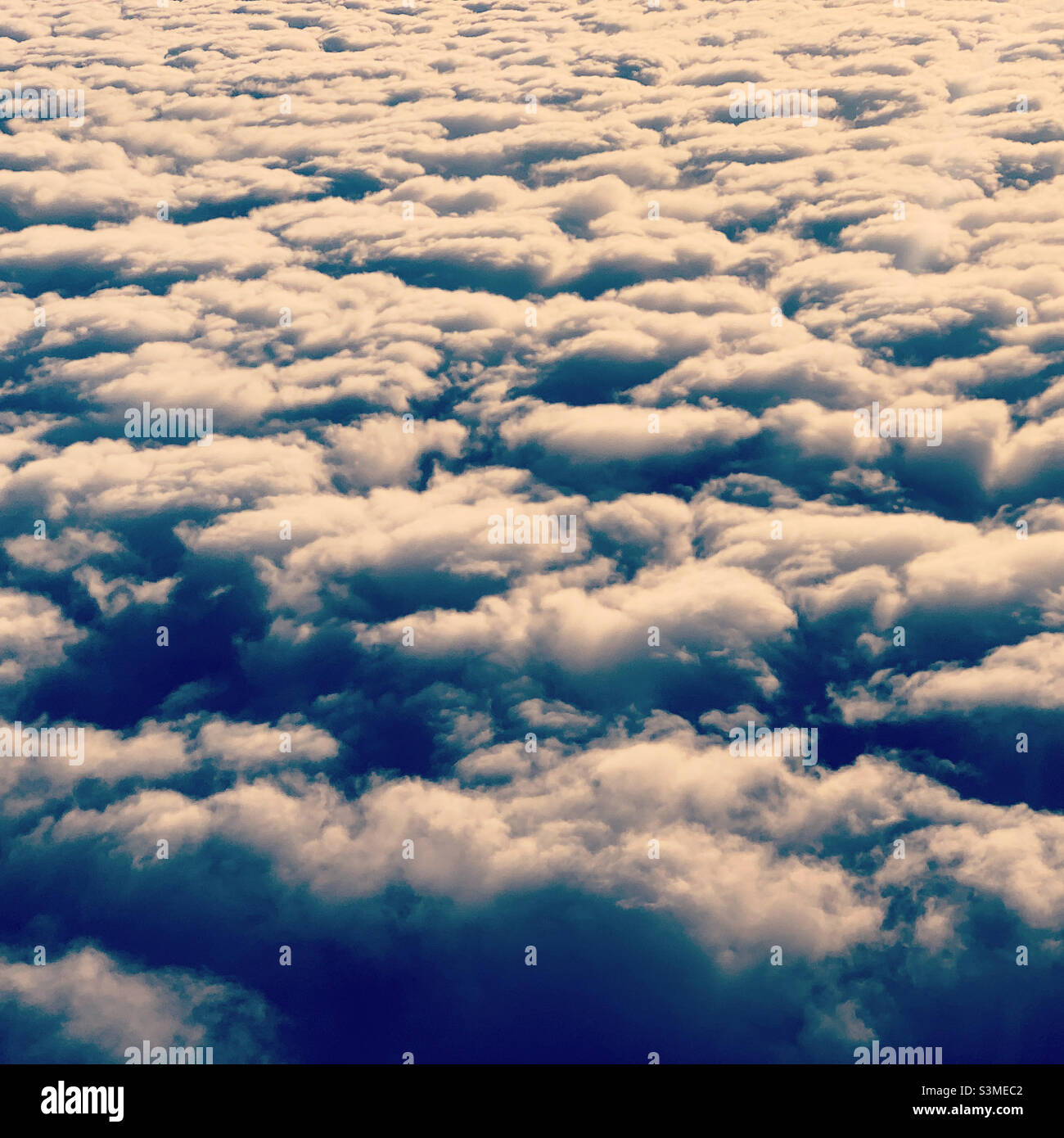 Clouds viewed from the window of an airplane Stock Photo - Alamy