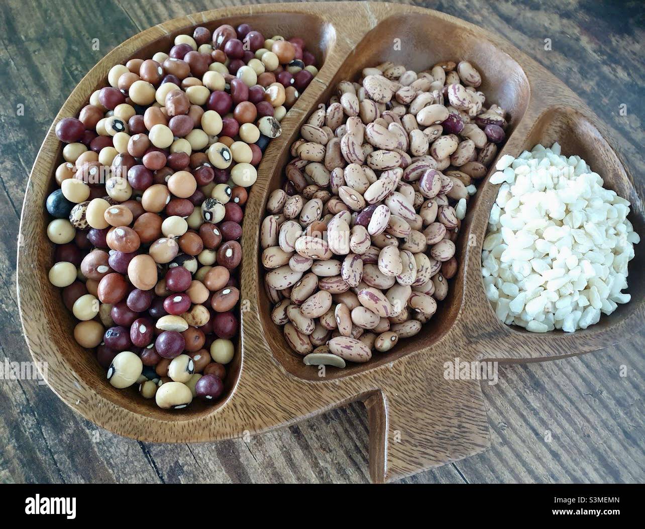 Bambara beans, rose coco beans, samp (dried stamped corn kernels Stock ...