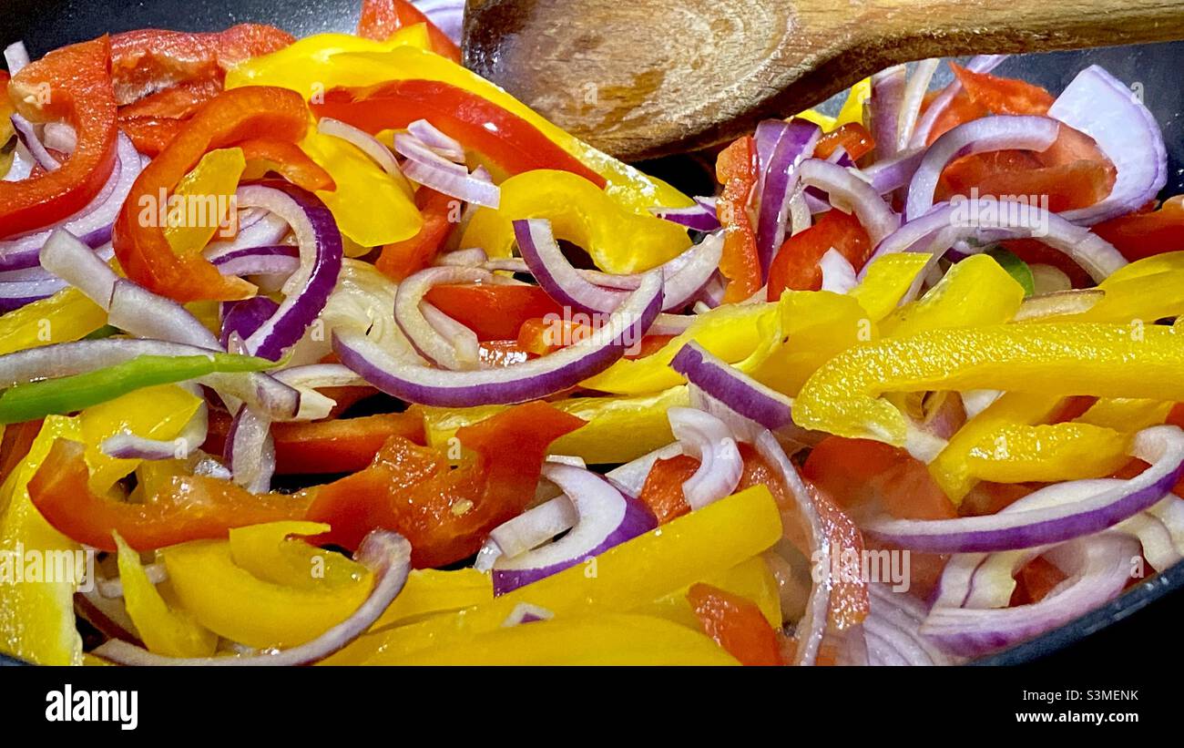 Healthy cooking with colourful food Stock Photo - Alamy
