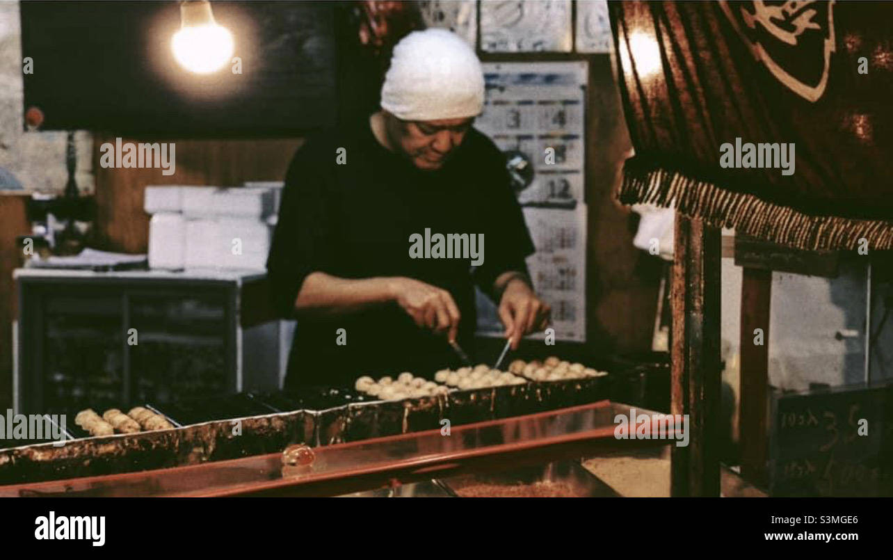 Takoyaki man making hi-res stock photography and images - Alamy