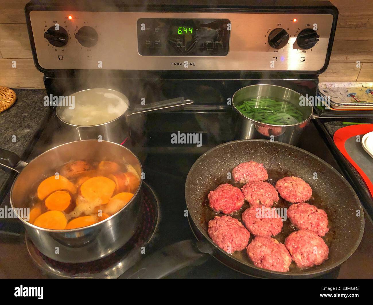 Dinner on the stove Stock Photo - Alamy