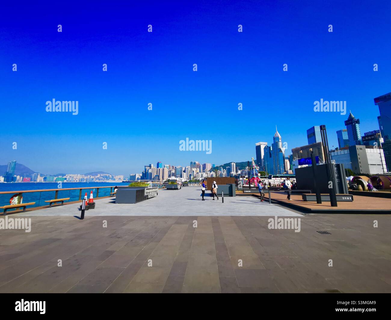 Wan Chai waterfront promenade in Hong Kong Stock Photo - Alamy