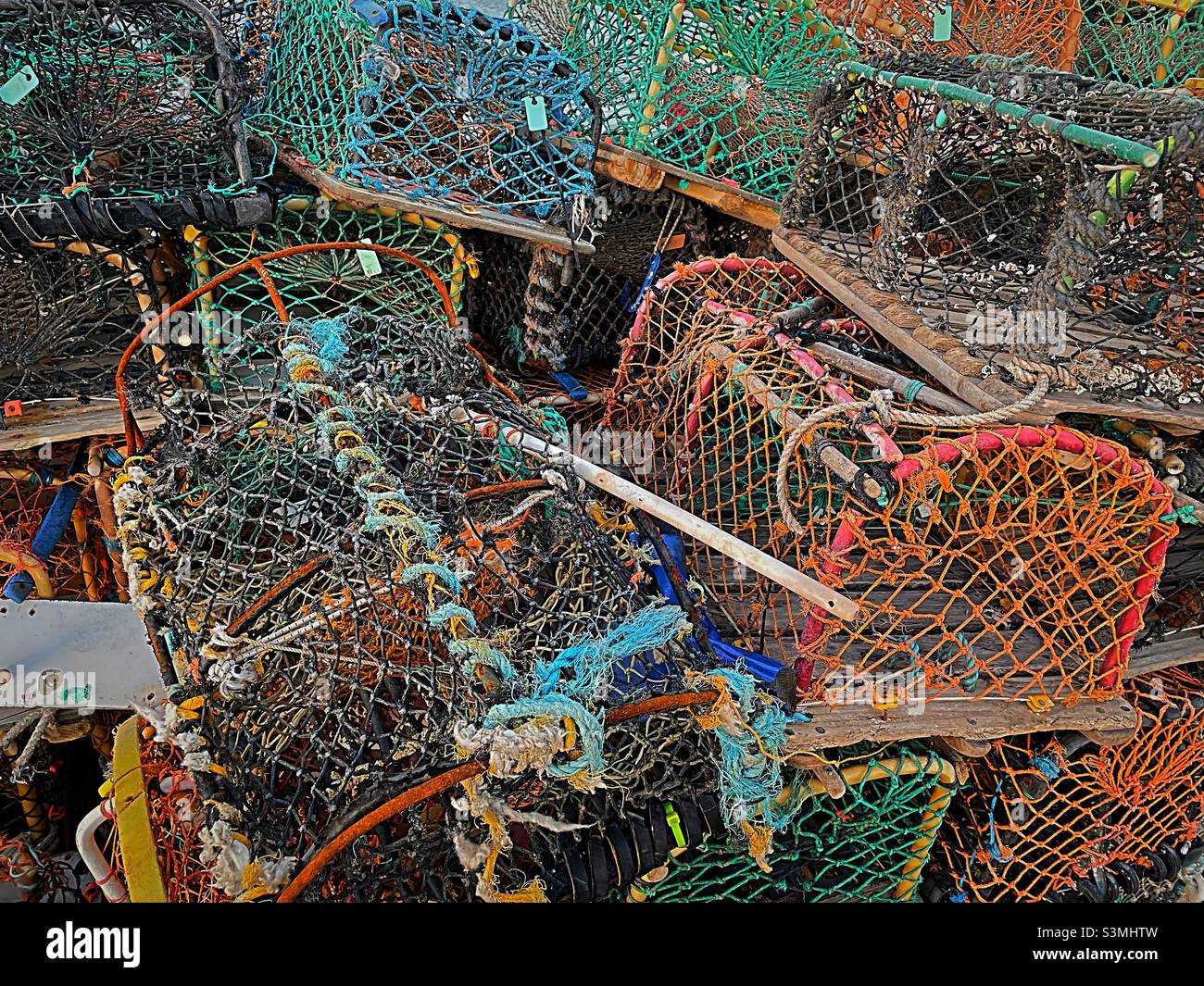 ‘A Fisherman’s Friend’ fishing pots stacked at the harbour ready for ...