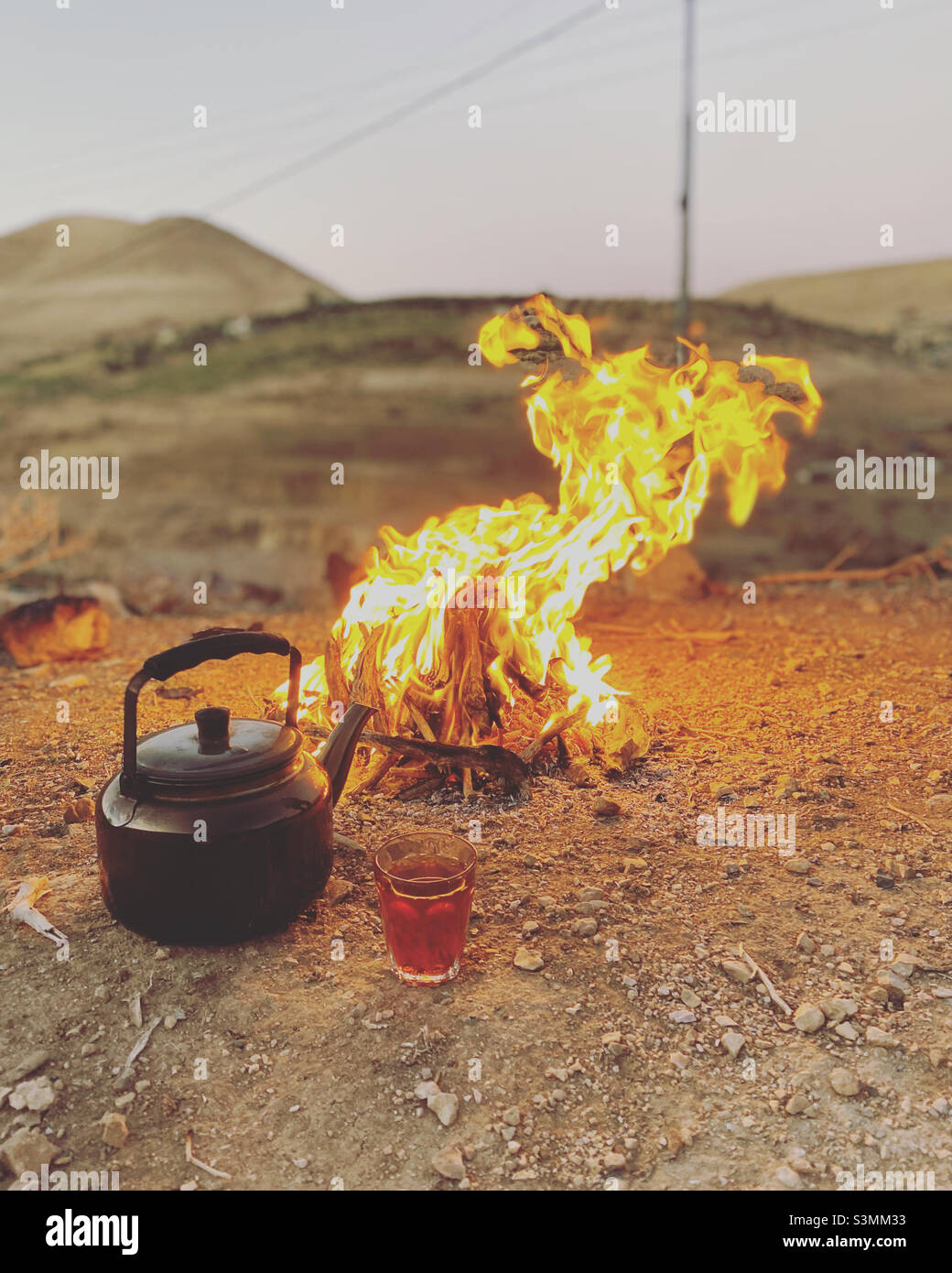 Sitting beside fire hi-res stock photography and images - Alamy