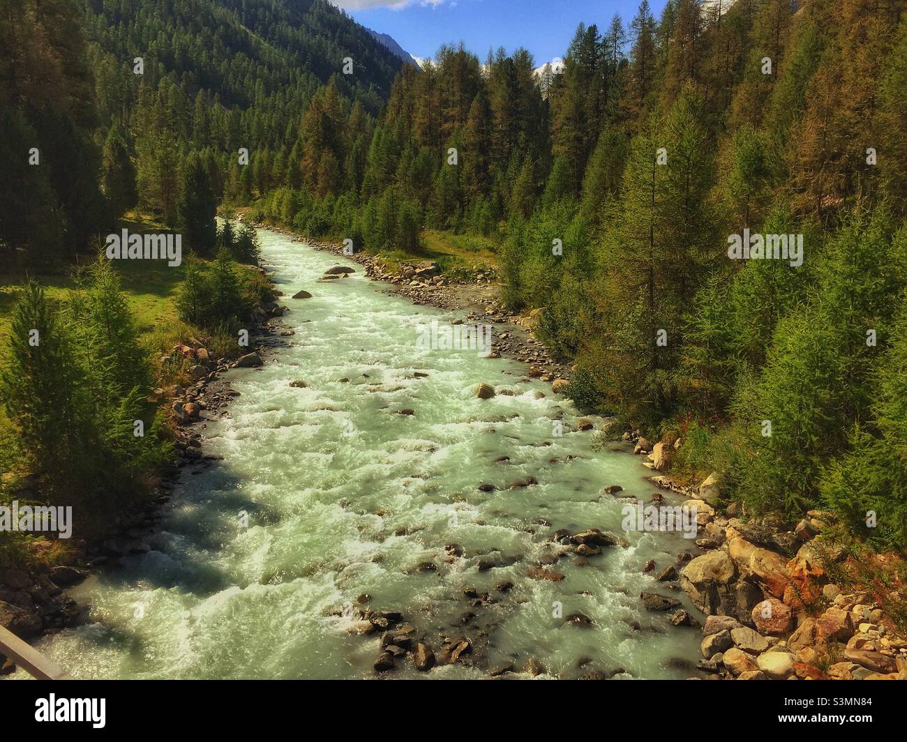 Swiss Stream running through Countryside Stock Photo - Alamy