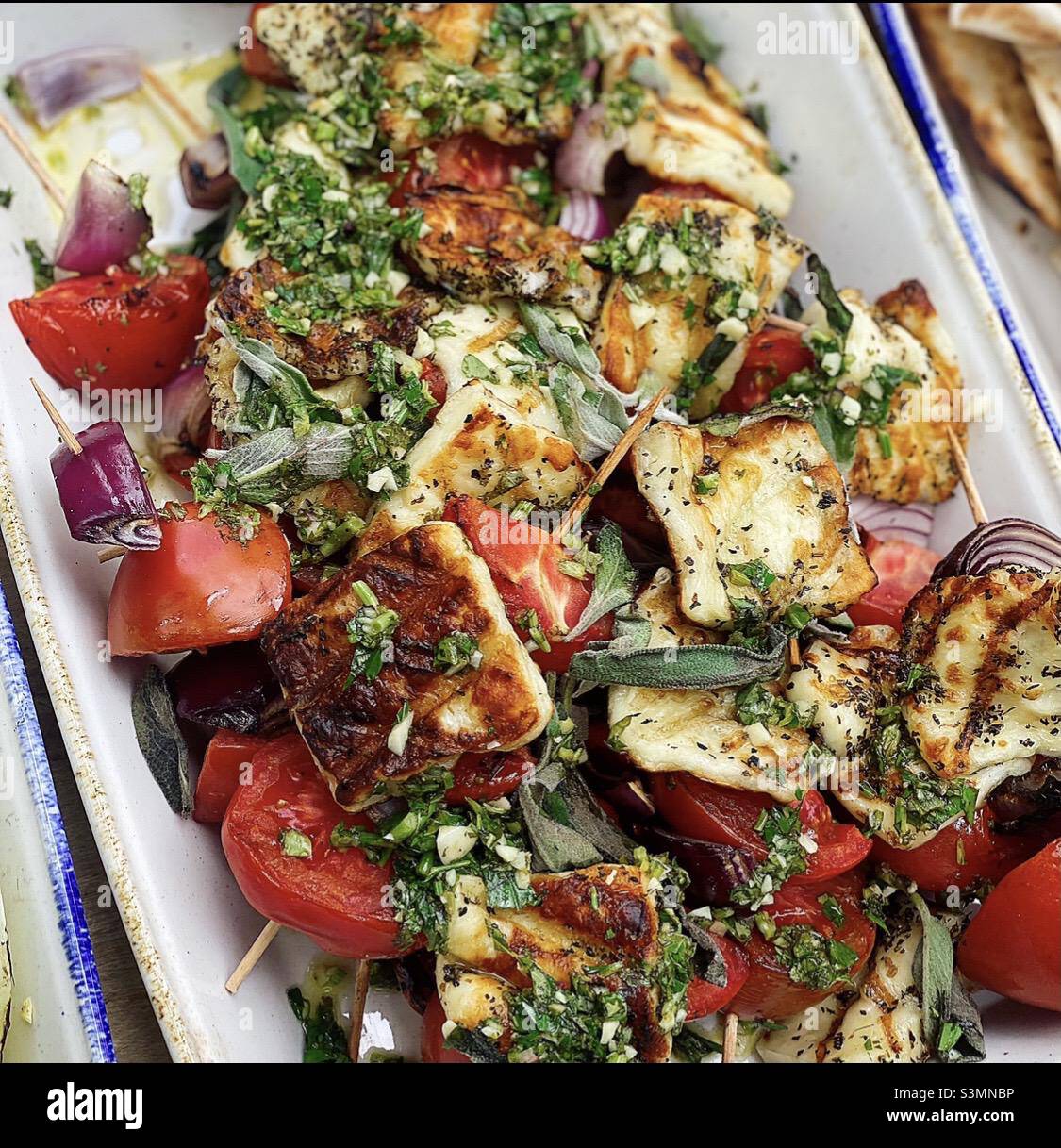 Halloumi with tomato hi-res stock photography and images - Alamy