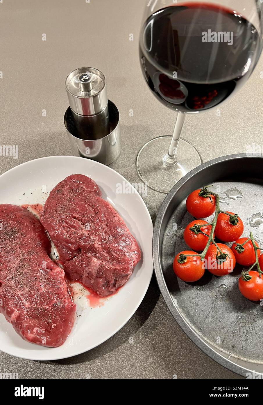 Preparing fillet steaks Stock Photo - Alamy