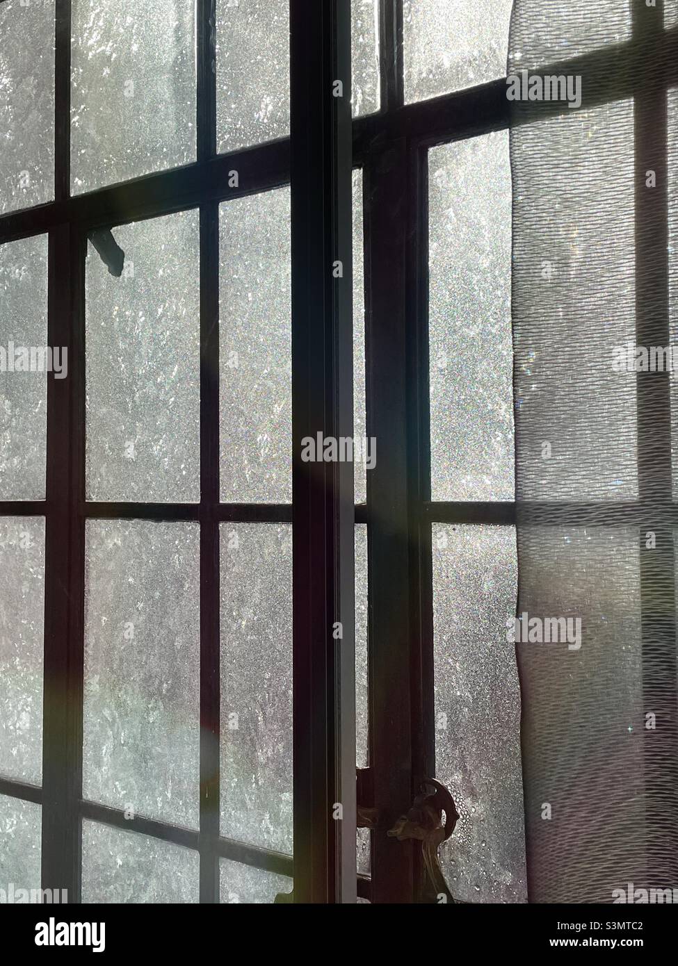 New York City apartment casement windows covered in ice during a ...