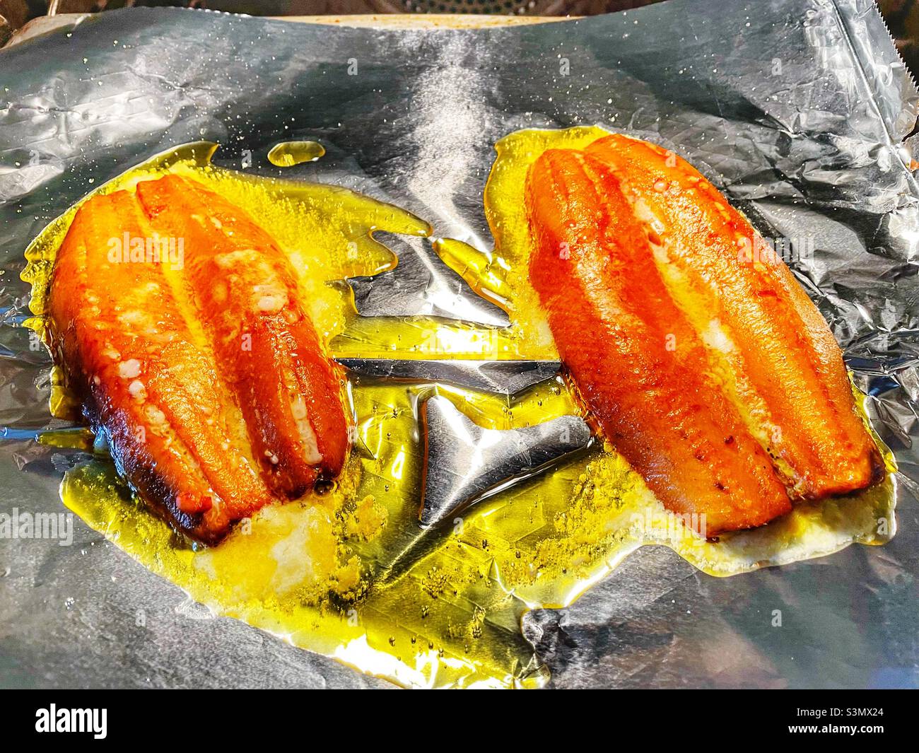 Scottish smoked herring fillets cooked in butter Stock Photo - Alamy