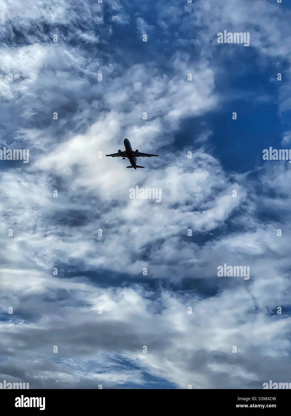 Passenger jet airplane coming in for landing at the Gold Coast Airport ...