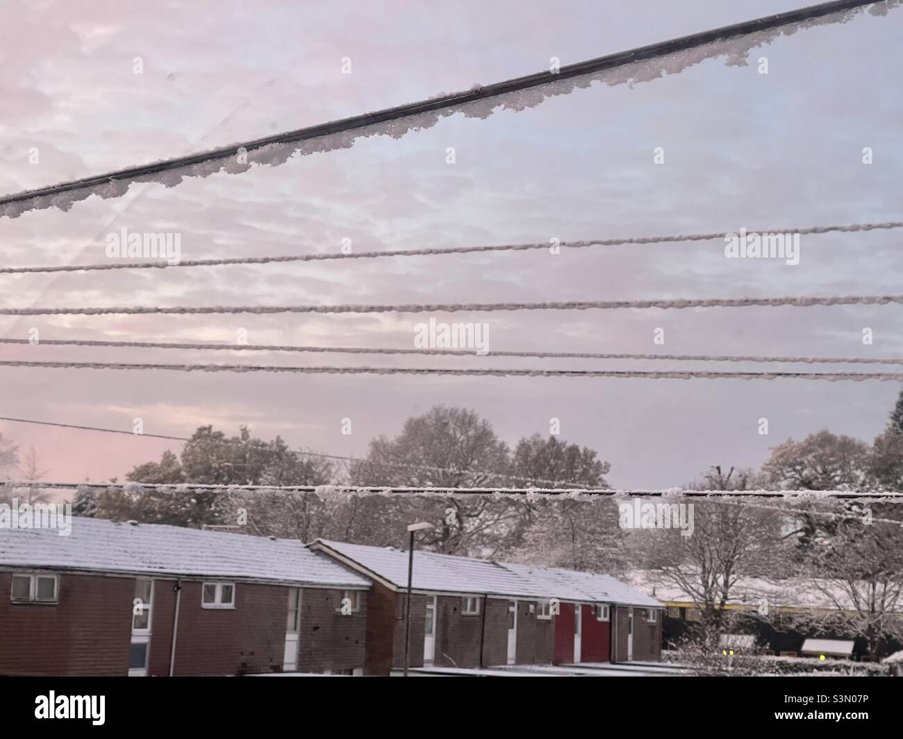 Snow frosting on telephone wires Stock Photo - Alamy