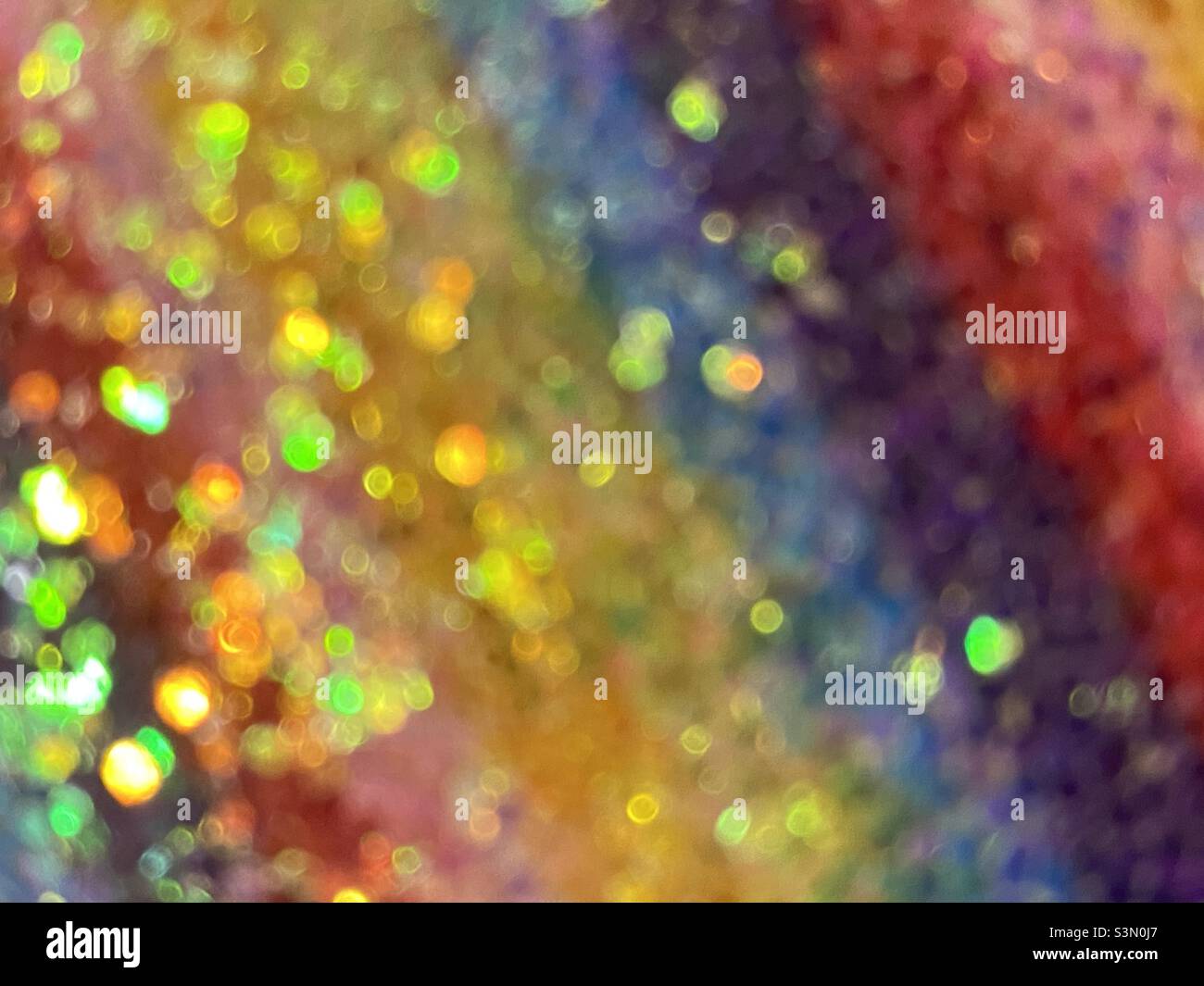 Bokeh twinkle rainbow lights background Stock Photo - Alamy