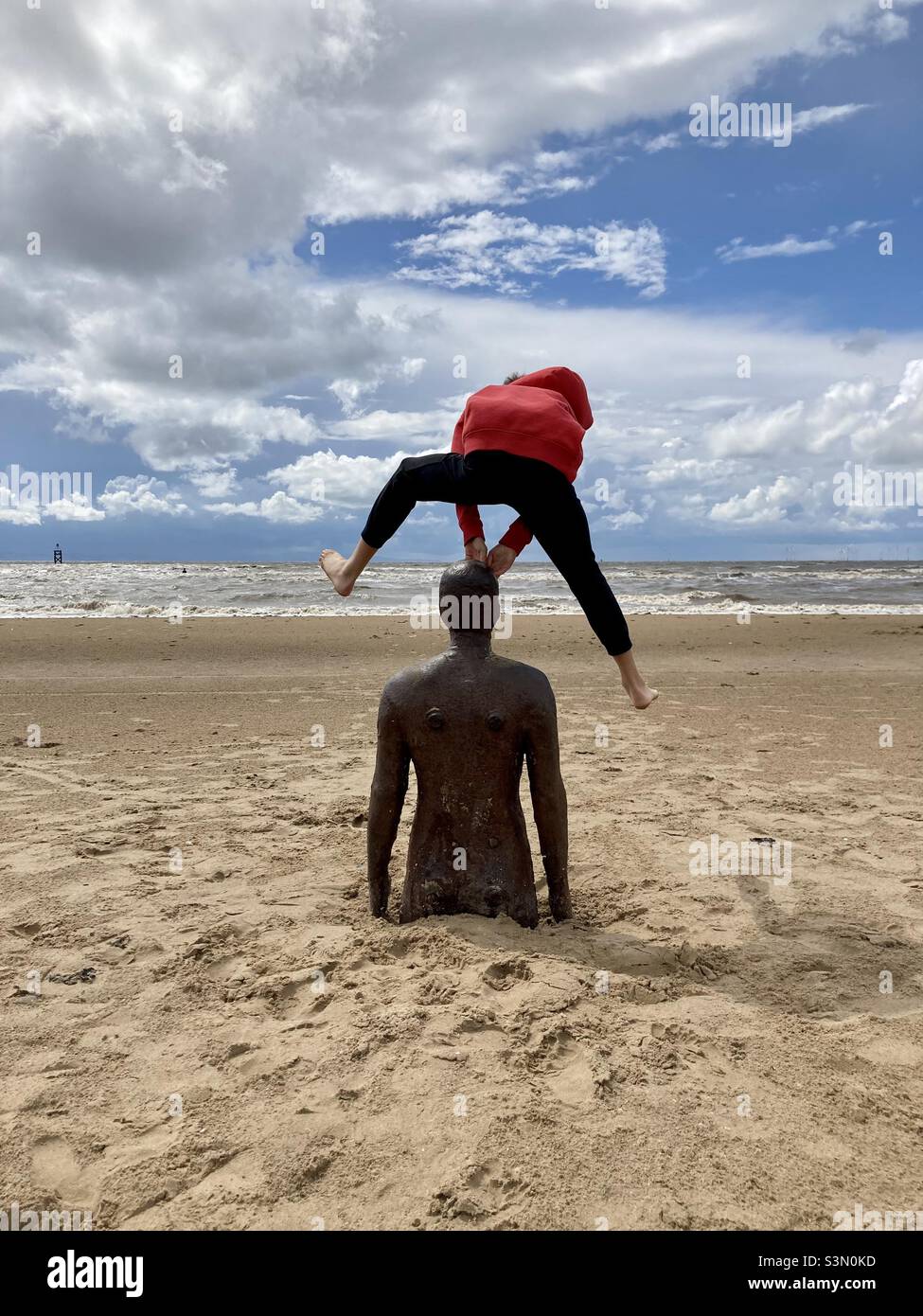 Jumping beach hi-res stock photography and images - Alamy