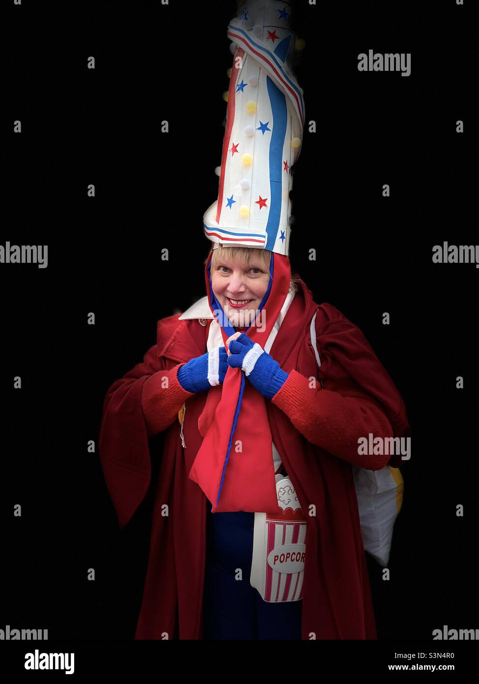 Woman with handmade whirligig hat and brightly colored clothing at ...