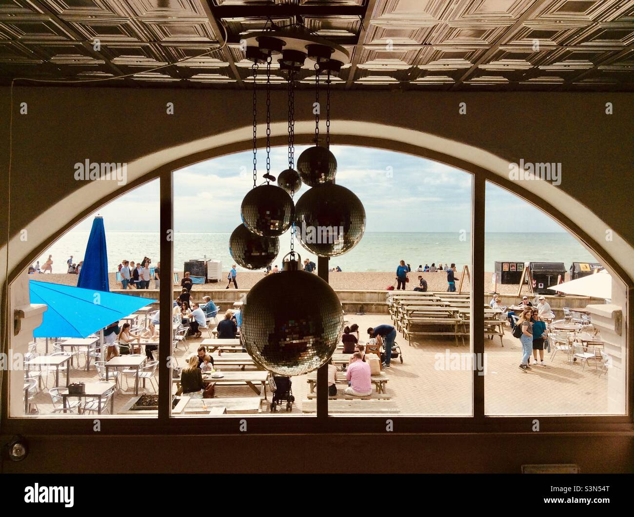 Semi circle window, disco balls and beyond - Brighton Beach, UK Stock ...