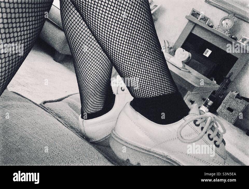 White fishnet tights hi-res stock photography and images - Alamy