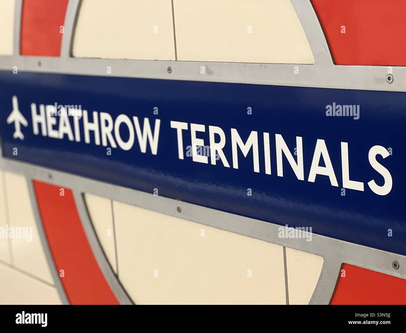 Heathrow Terminals London Underground Roundel sign Stock Photo - Alamy