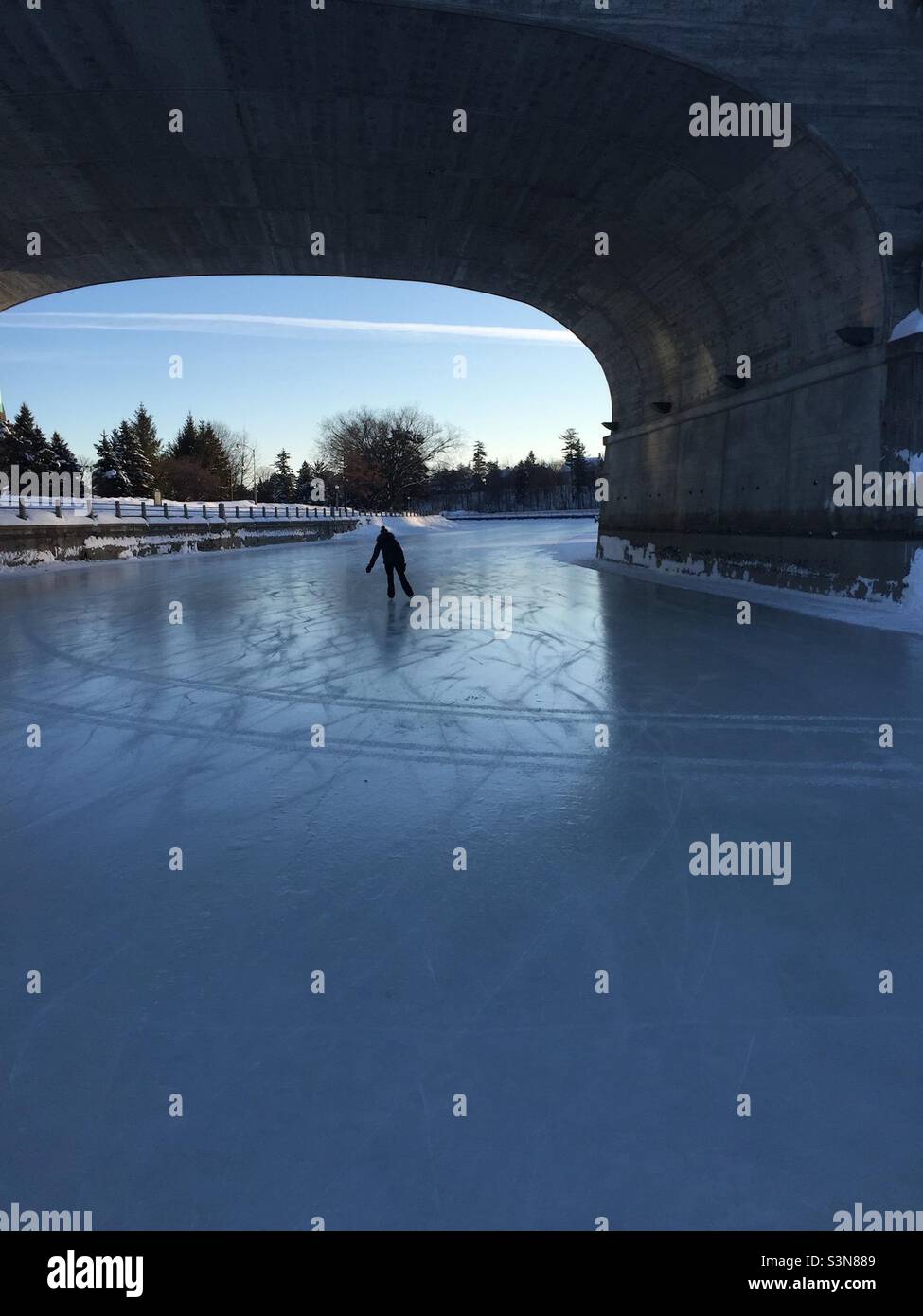Early morning skate under the Bank Street bridge on the Rideau Canal in ...