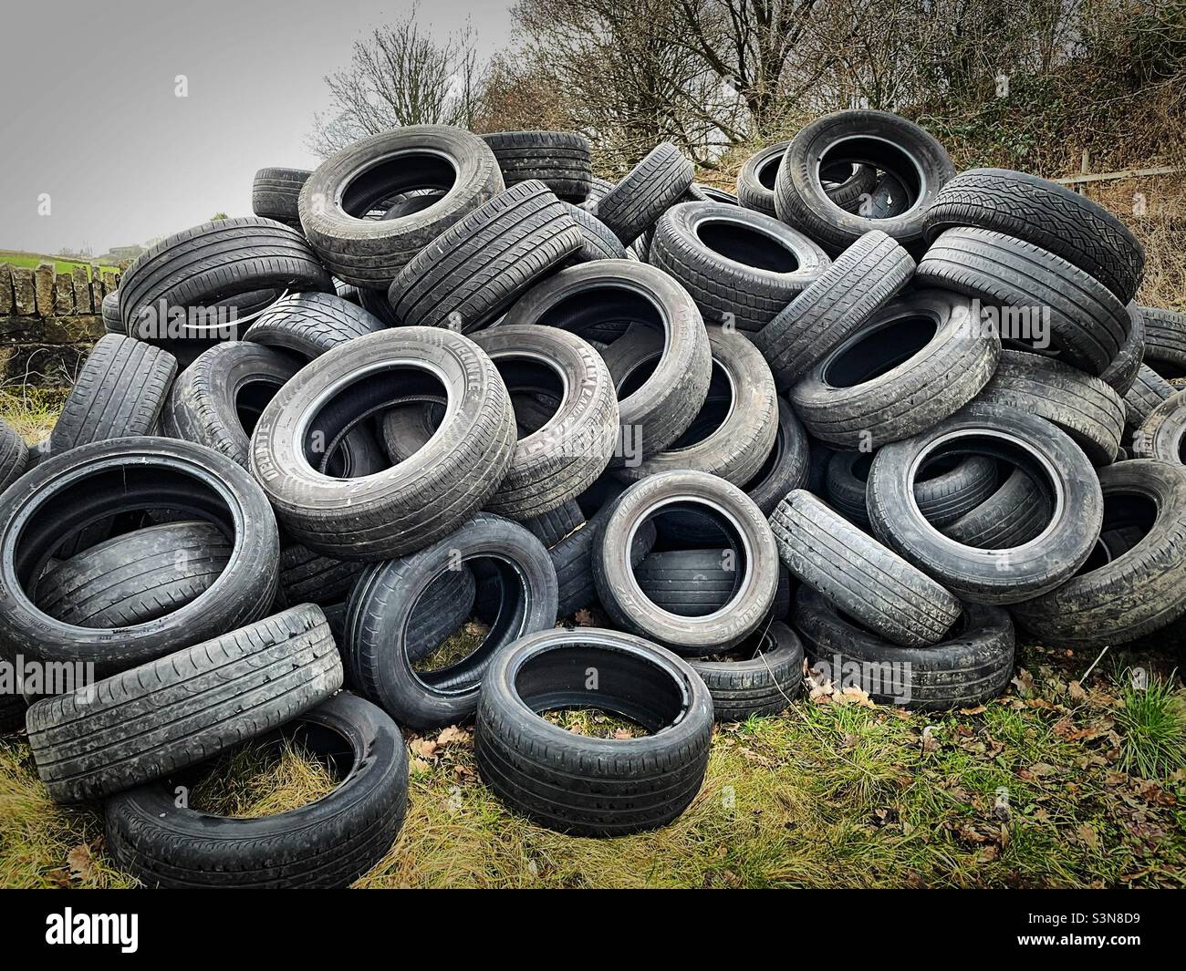 ‘Tyre-d of the same old scenery’ tyres piled up high in a Farmers Field ...