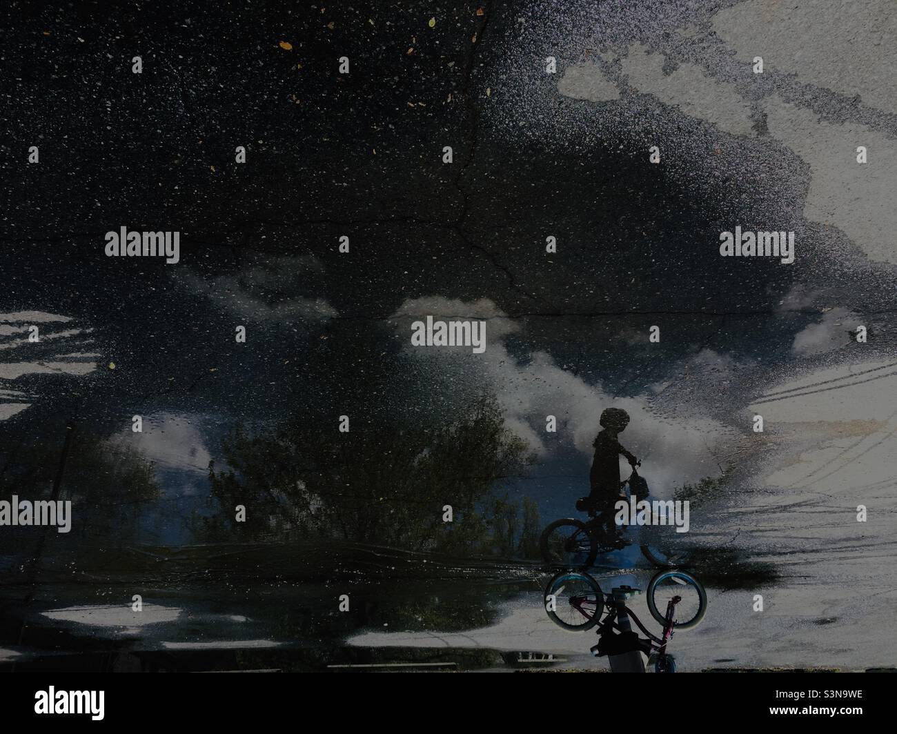 Boy biking hi-res stock photography and images - Alamy