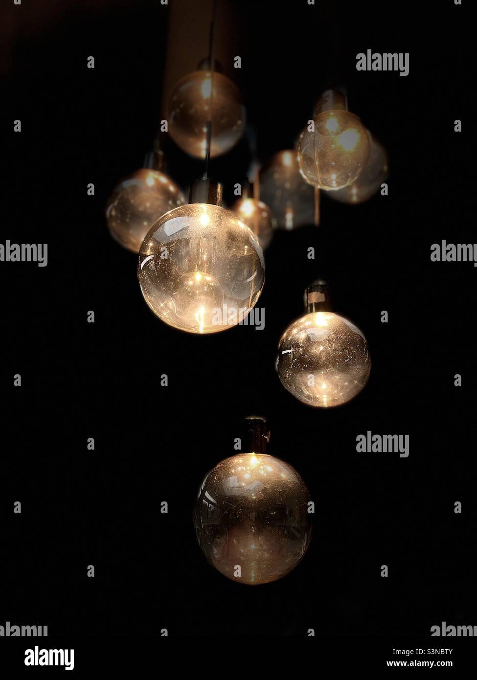 Cluster of pendant lights hi-res stock photography and images - Alamy