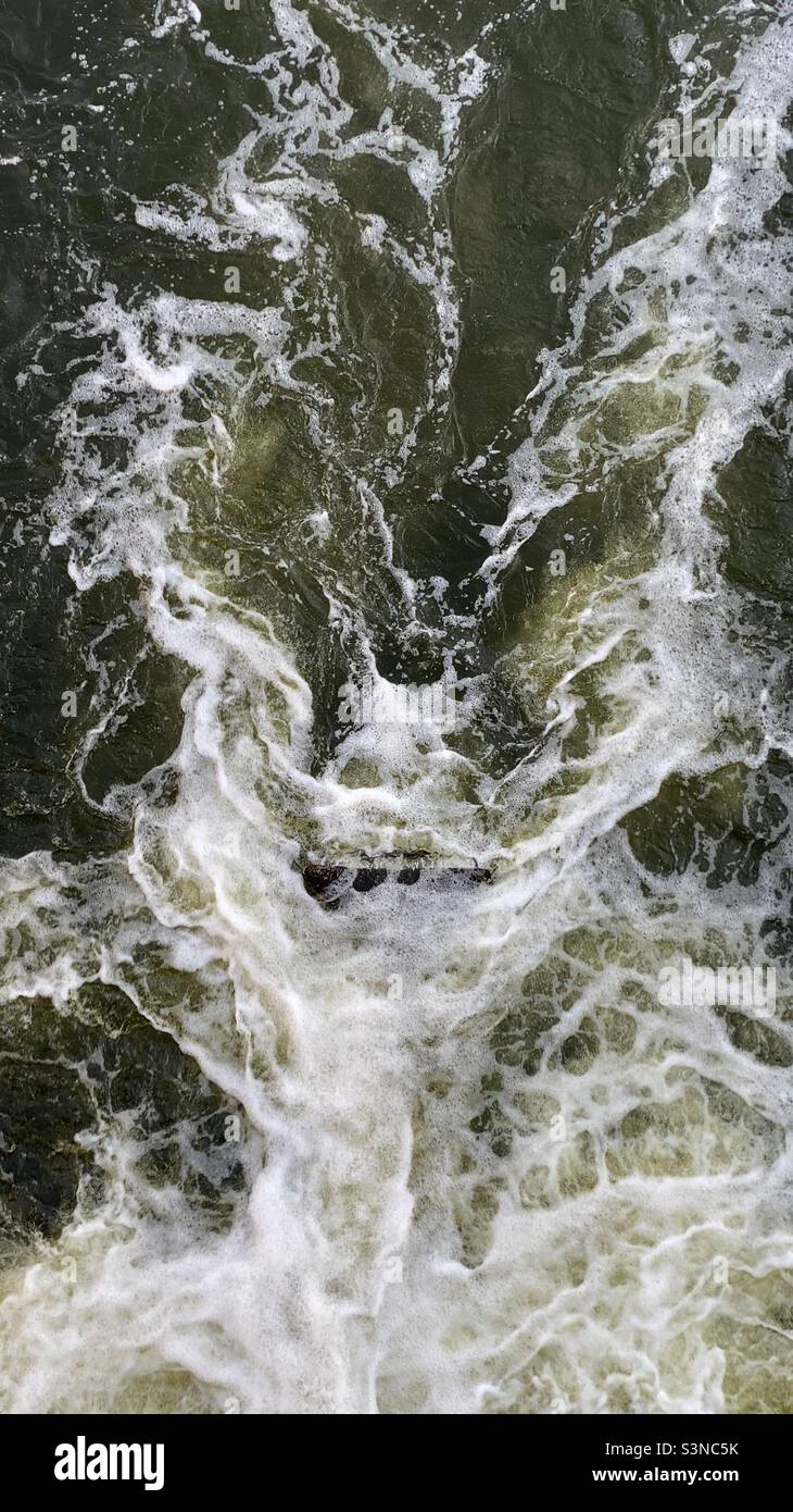 view of the raging water at the hydroelectric station Stock Photo - Alamy