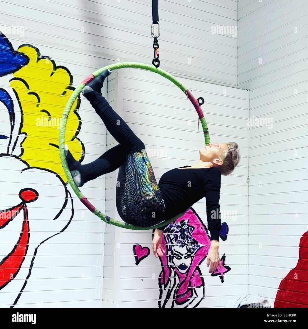 Lyra hoop lesson beginner Stock Photo - Alamy