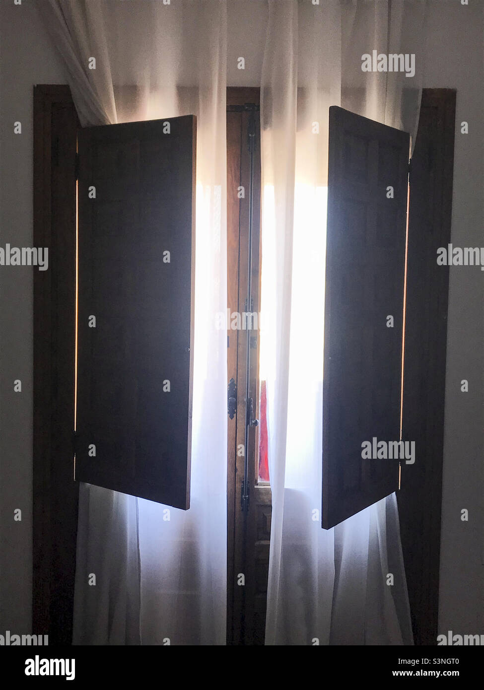 Sun coming through window in Spain Stock Photo - Alamy