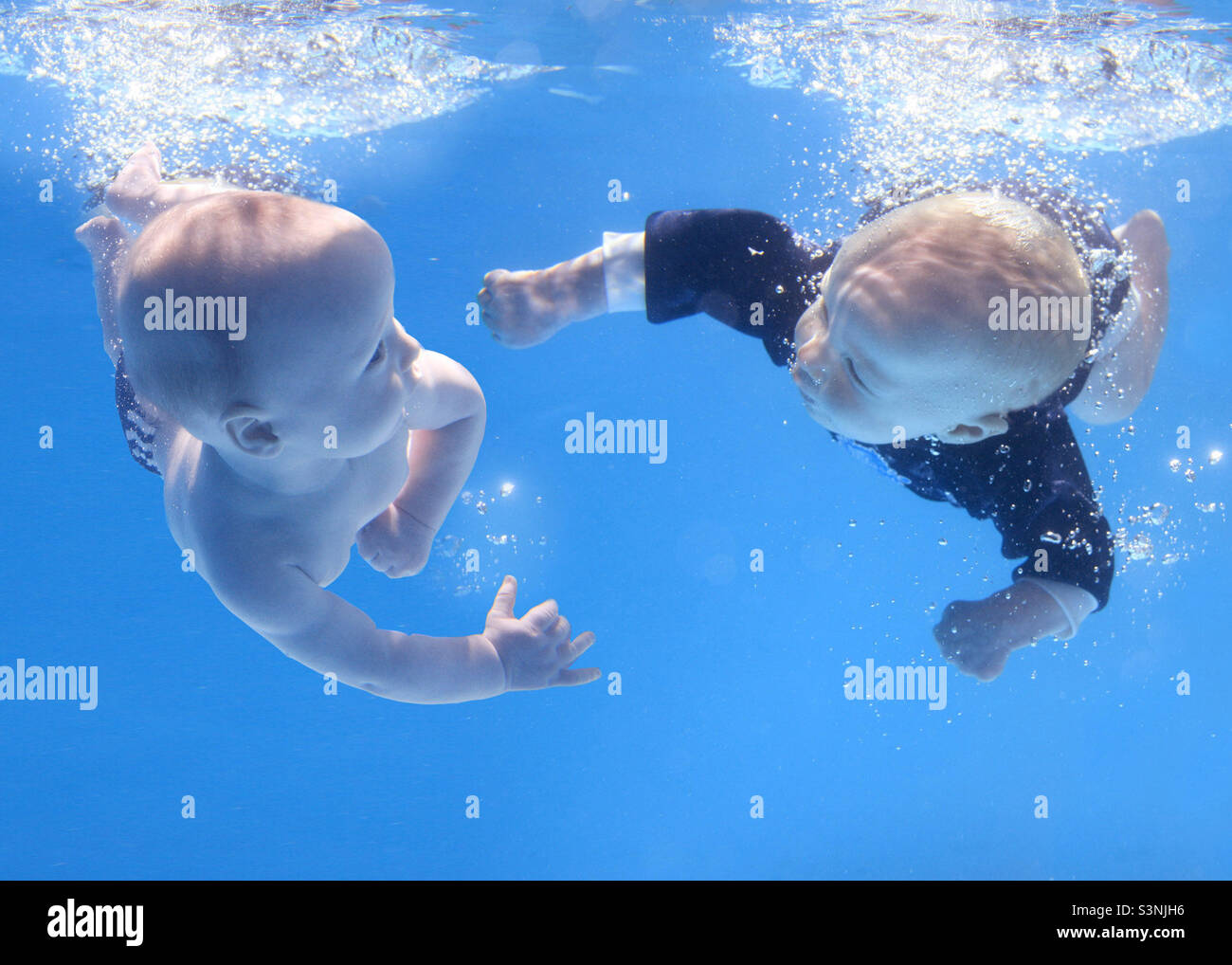Baby underwater hi-res stock photography and images - Alamy