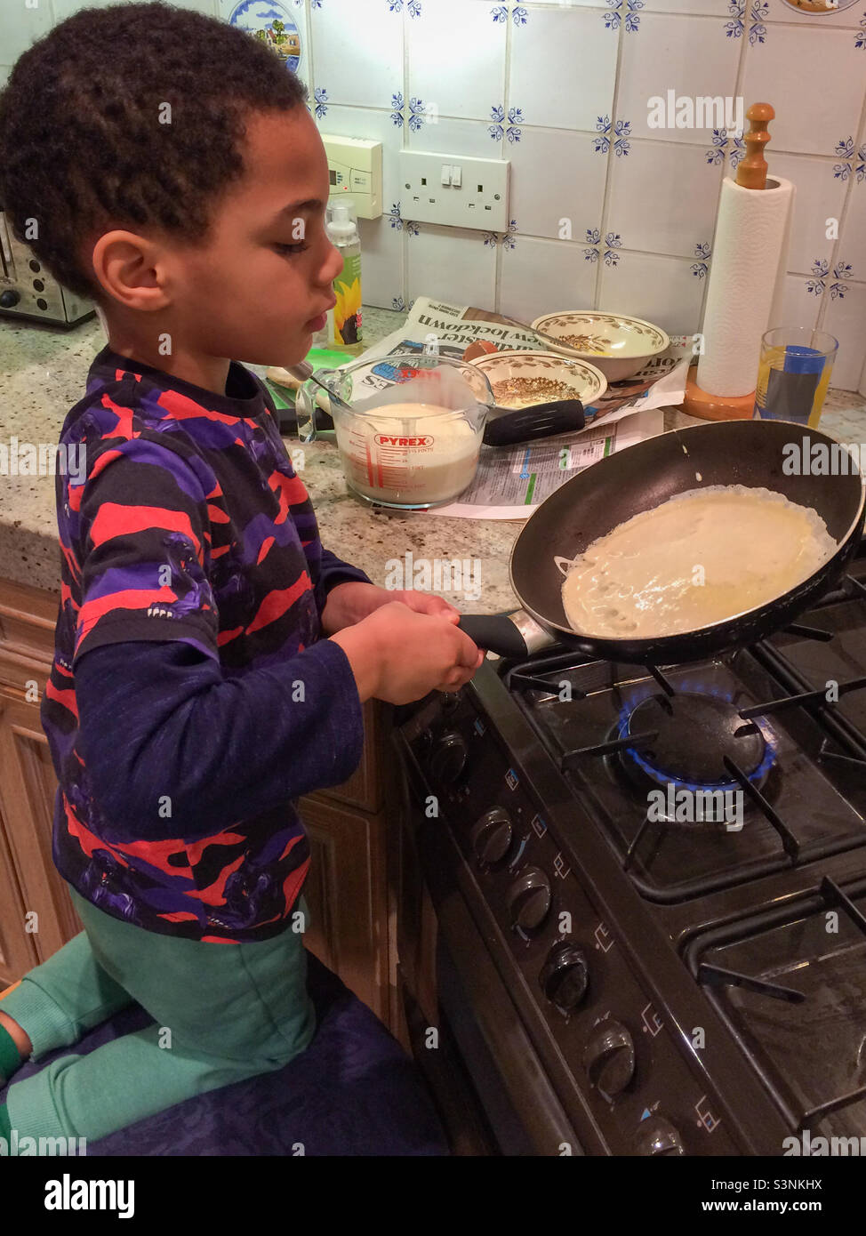 Child cooking stove hi-res stock photography and images - Alamy